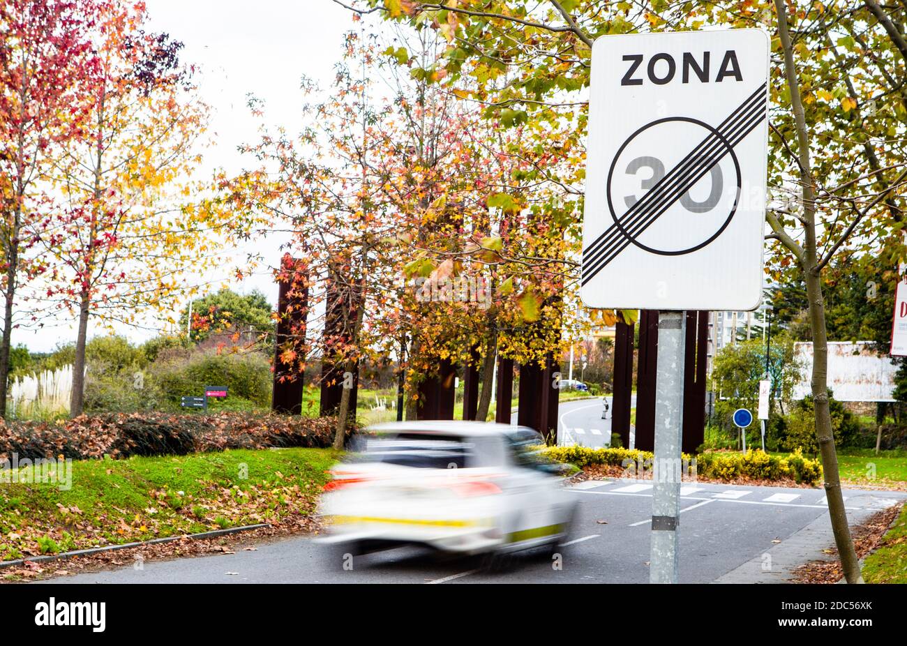 road with end of limitation sign at speed of 30 km / h with background ...