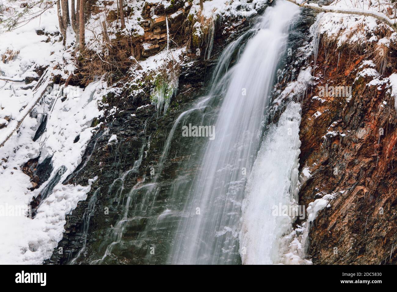 Natural water cascade in winter . Frost waterfall scenery Stock Photo ...