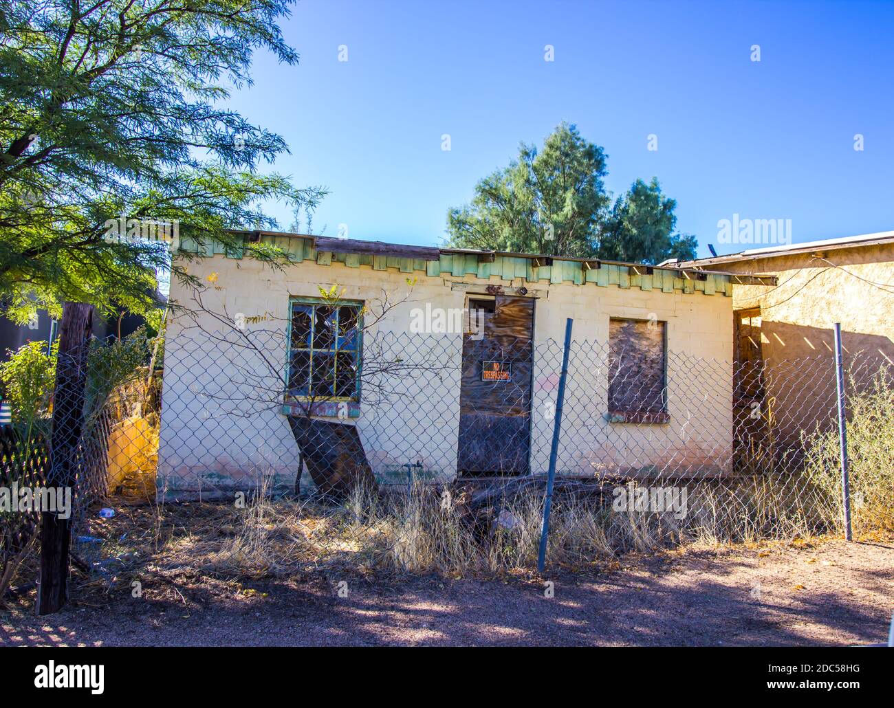 Uninhabitable One Level Home With Boarded Up Window & Doorway Stock ...
