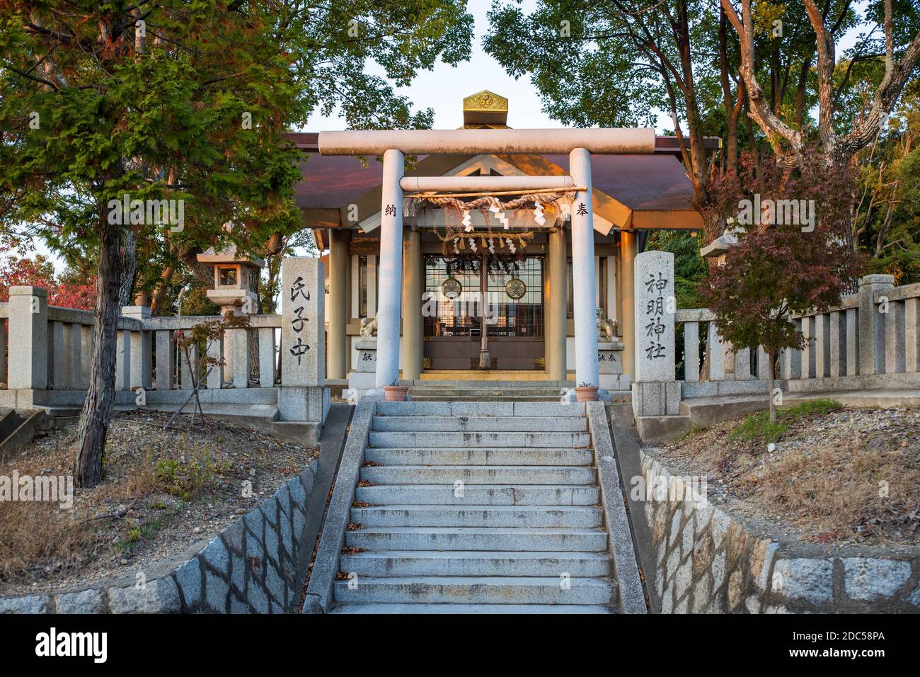 Stairs leading up to empty shrine in late afternoon sun Stock Photo - Alamy