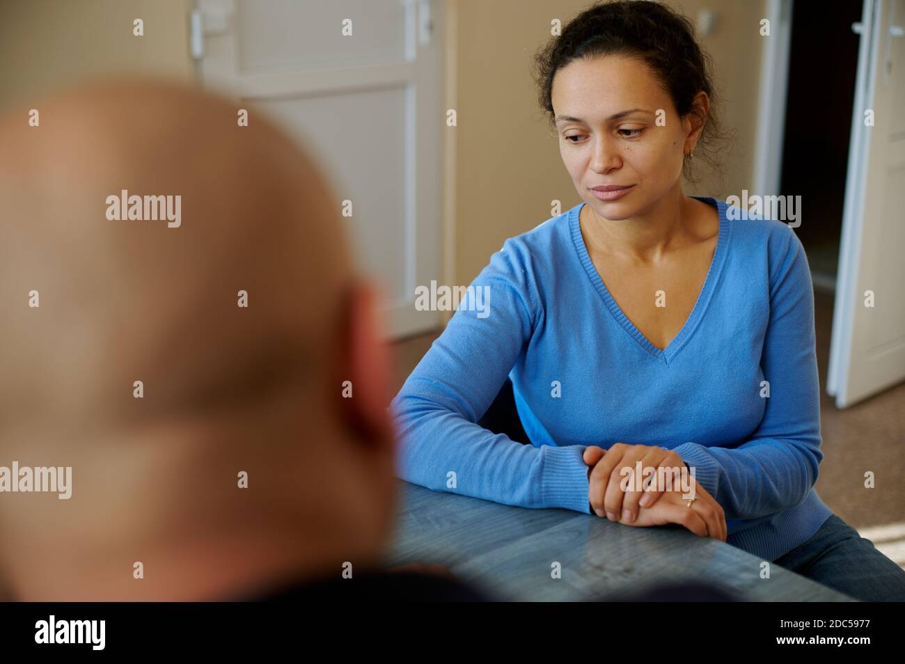 The doctor's consultation. The portrait of a patient sitting in front ...