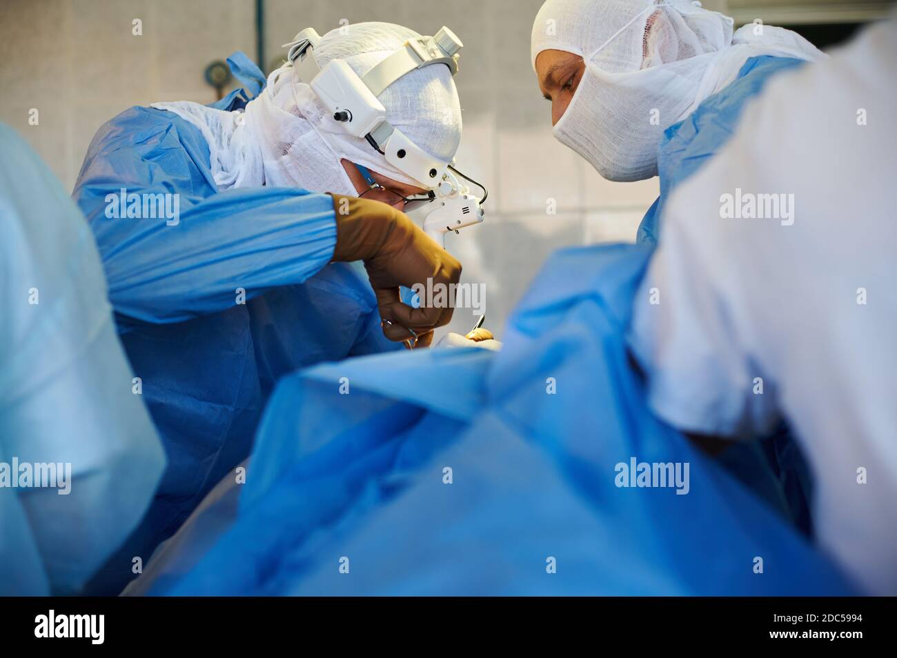 Surgery. Surgeon performs the stage of surgical intervention Stock ...