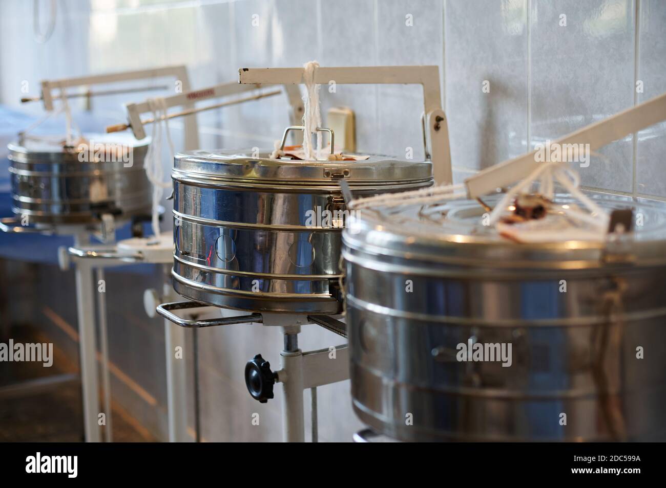 Surgery. Metal containers with sterile material along the wall in ...