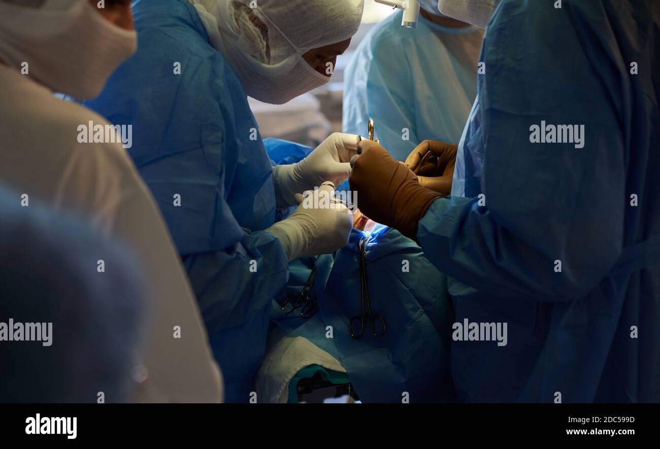 Plastic surgeons performing surgery hi-res stock photography and images ...