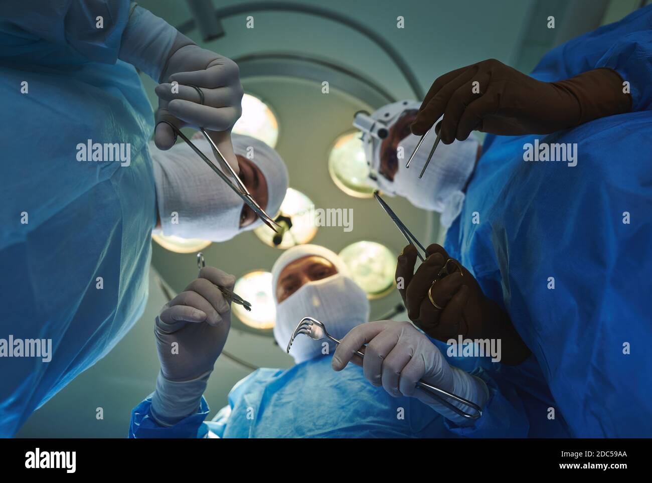 View through the eyes of the patient during a surgical operation. Three ...