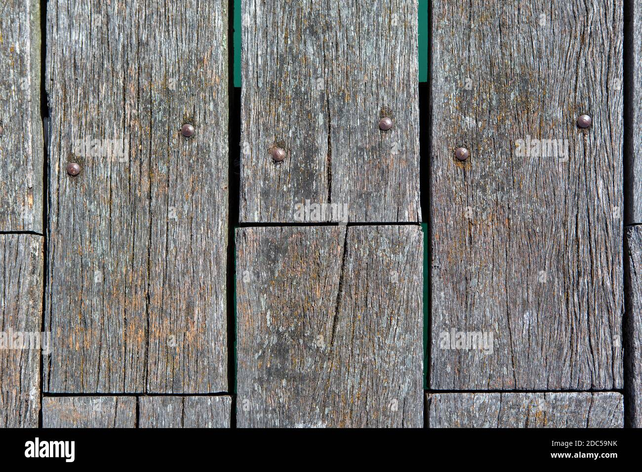 An abstract photo of the wooden planks and joinery of a jetty in south ...