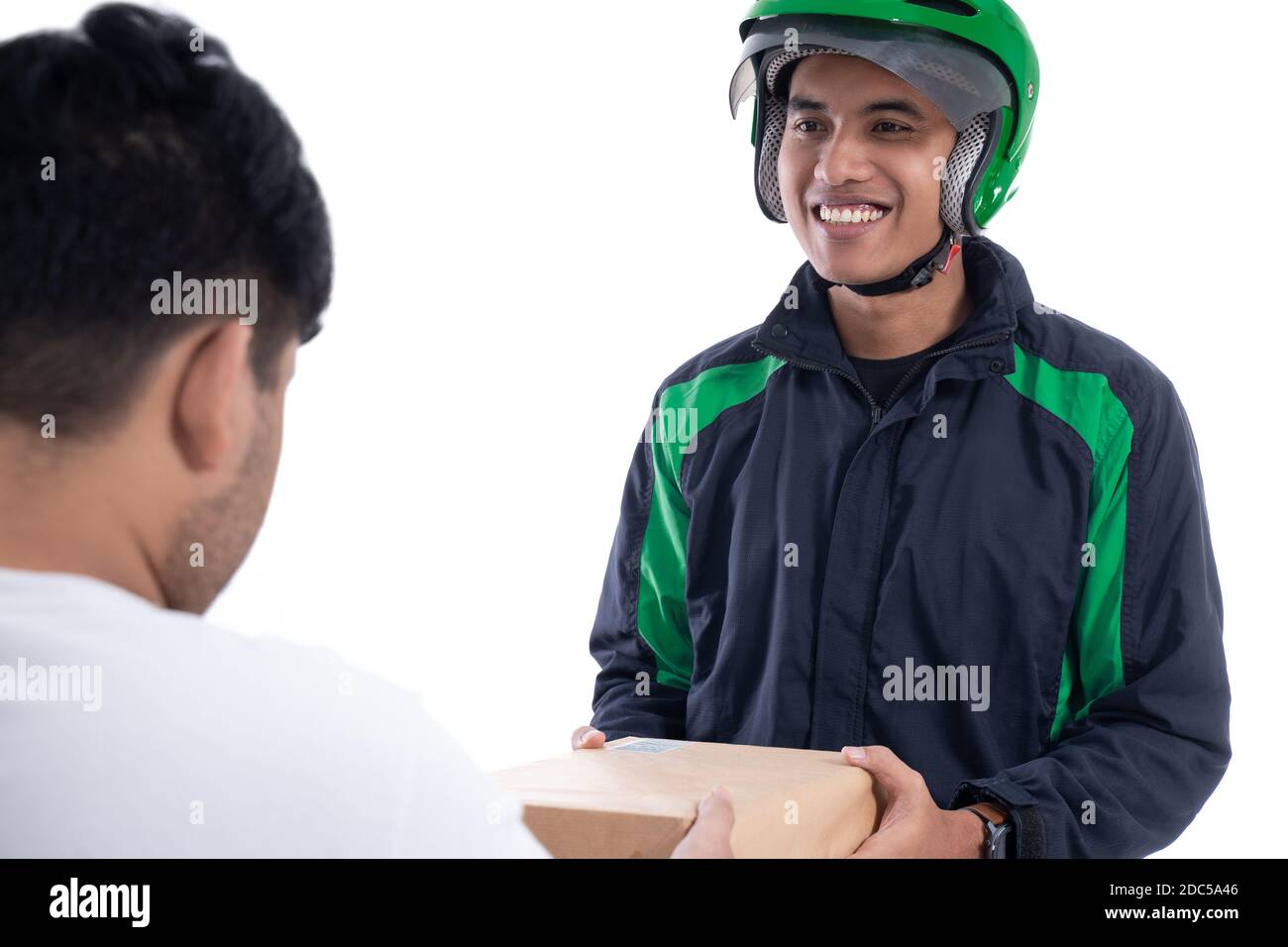 Delivery driver handing hi-res stock photography and images - Alamy