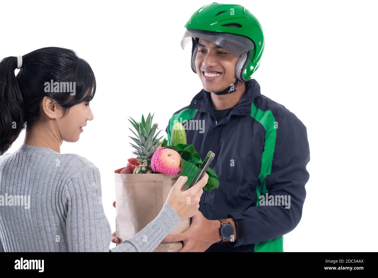 online grocery shopping. delivery man deliver food order to customer ...