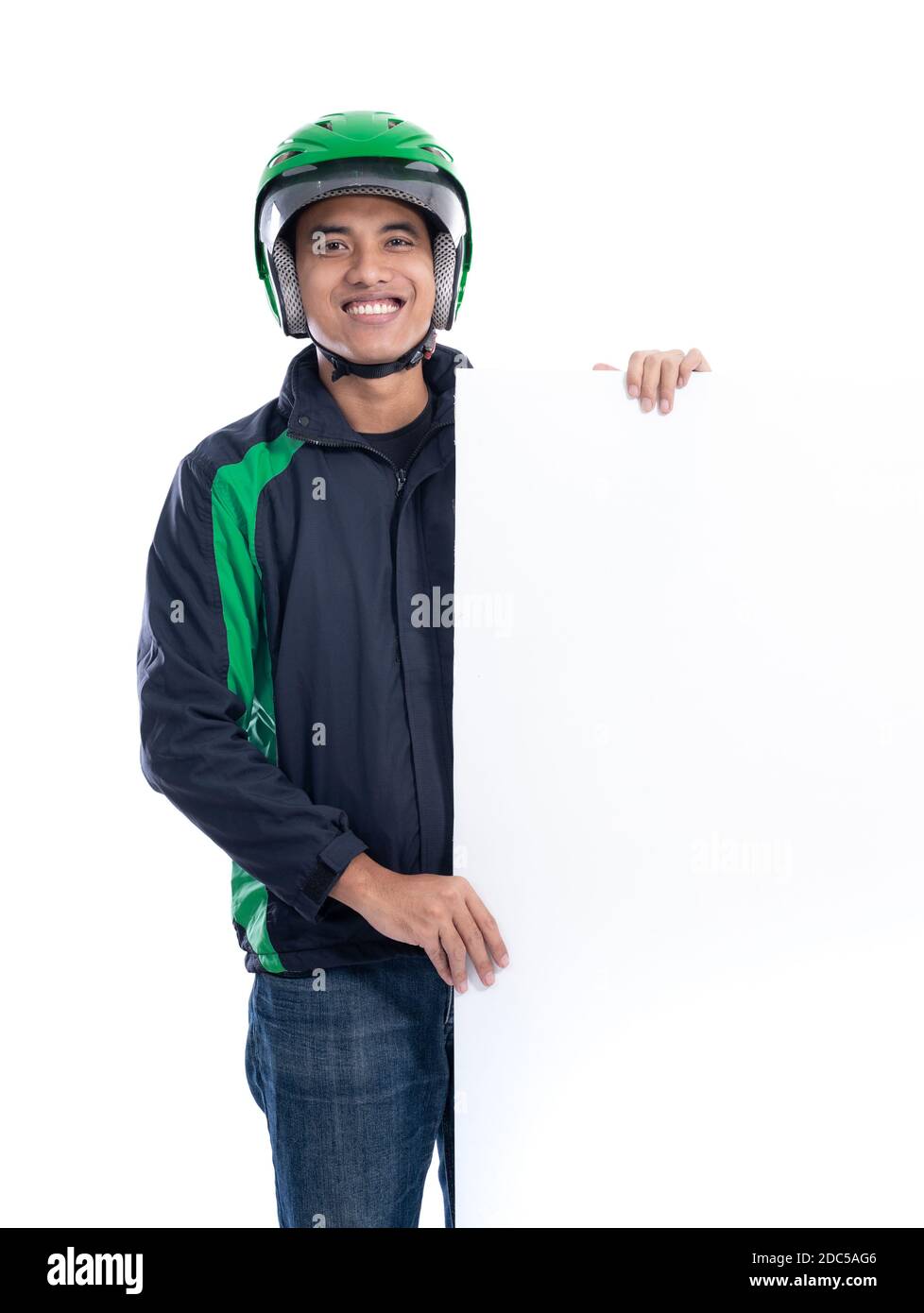 portrait of uber rider with helmet holding blank white board Stock ...