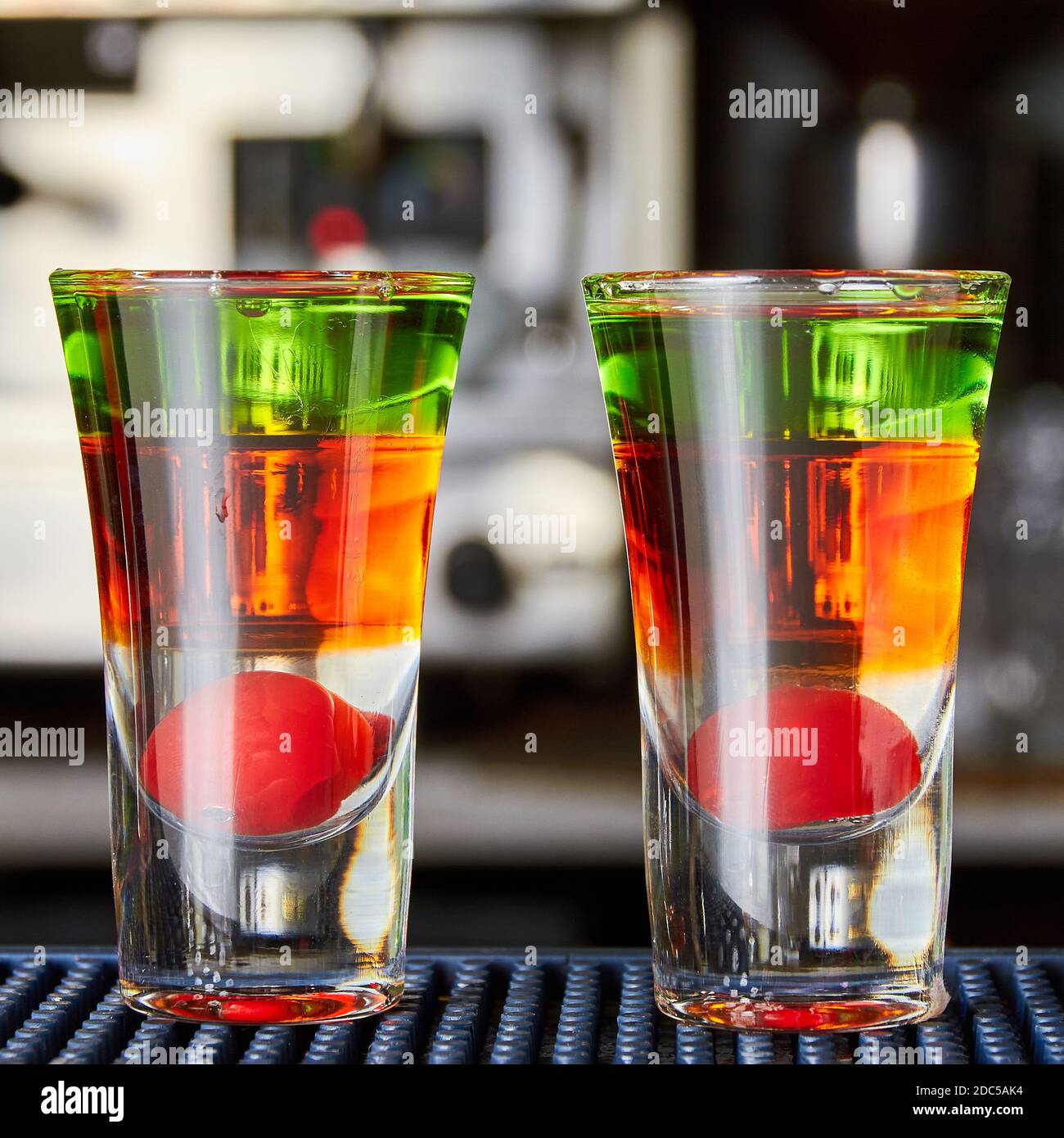 Multicolored alcoholic drinks shots on the bar counter Stock Photo - Alamy