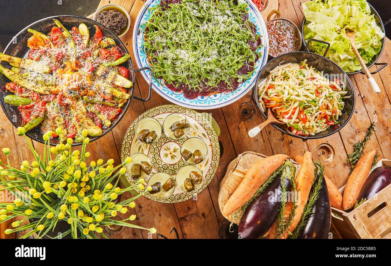 Buffet with a large selection of vegetable dishes and salads, healthy ...