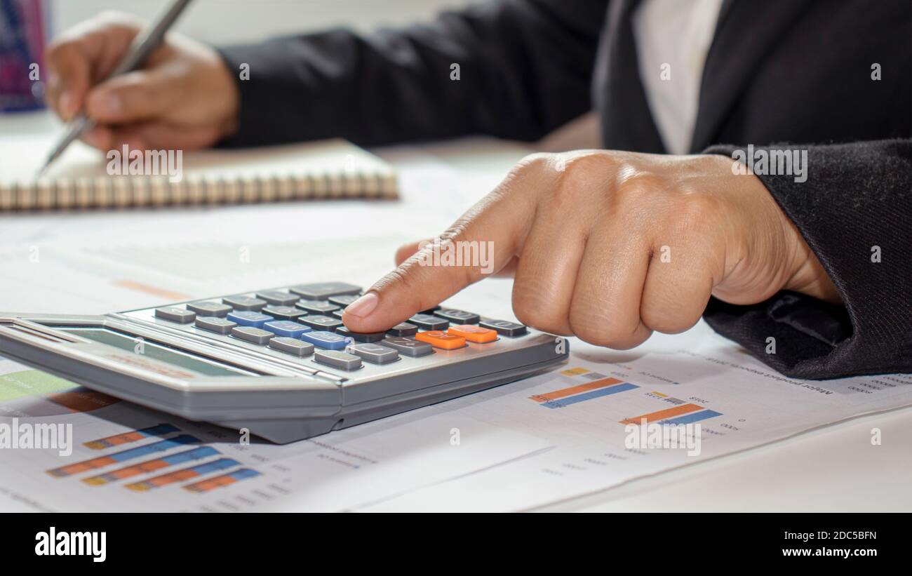 Calculate profit hi-res stock photography and images - Alamy