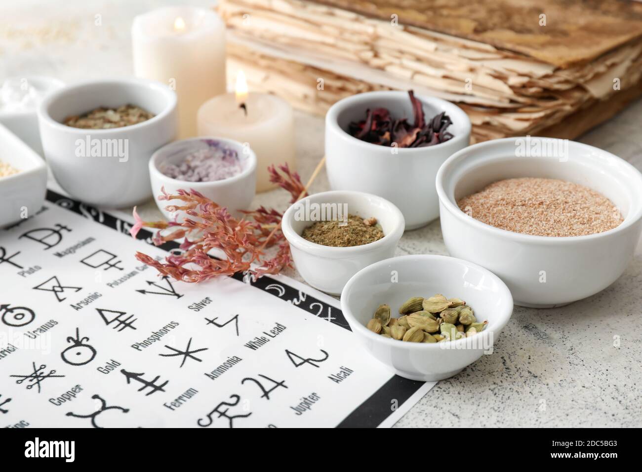 Alchemical symbols and ingredients for preparing potions on light ...