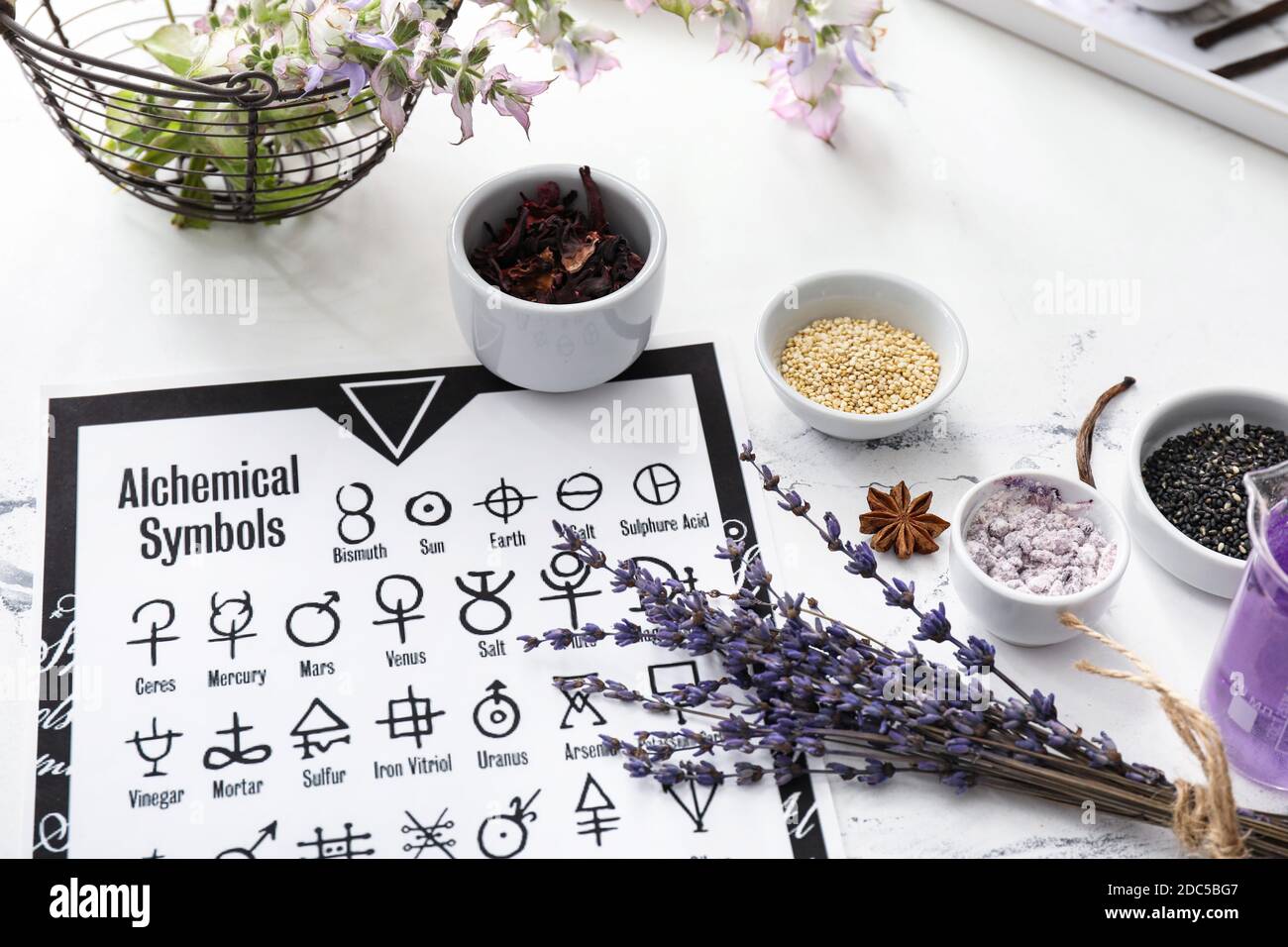 Alchemical symbols and ingredients for preparing potions on white ...