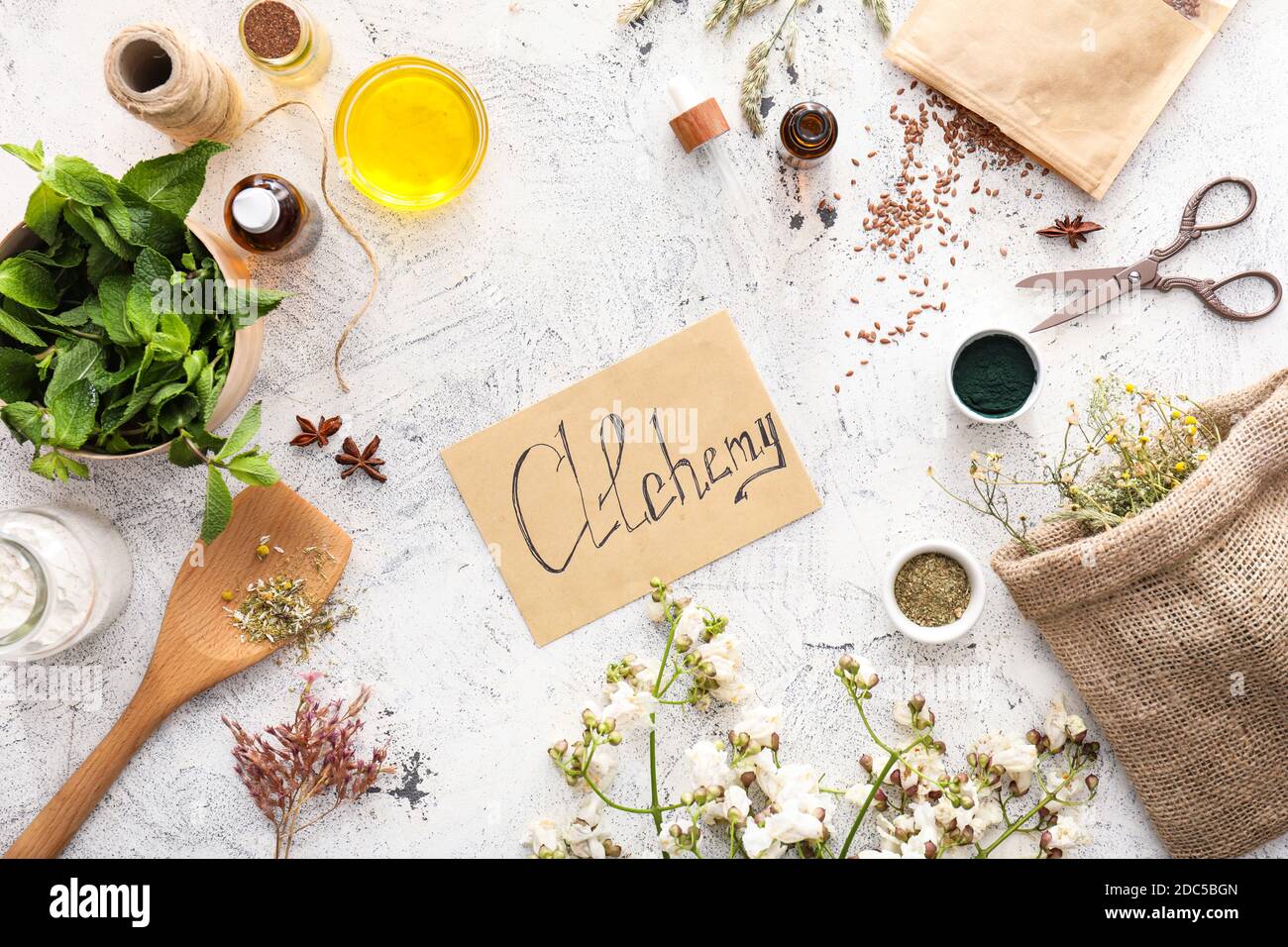 Paper sheet with text ALCHEMY and ingredients for preparing potions on ...
