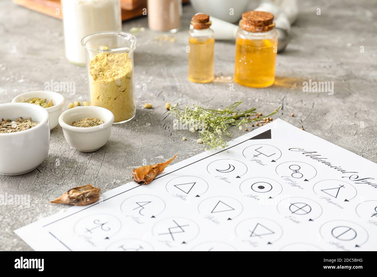 Alchemical symbols and ingredients for preparing potions on grunge ...