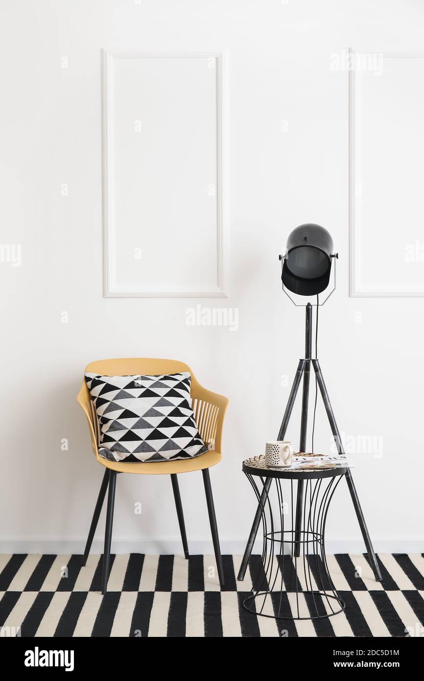 Interior of modern room with chair and table Stock Photo - Alamy