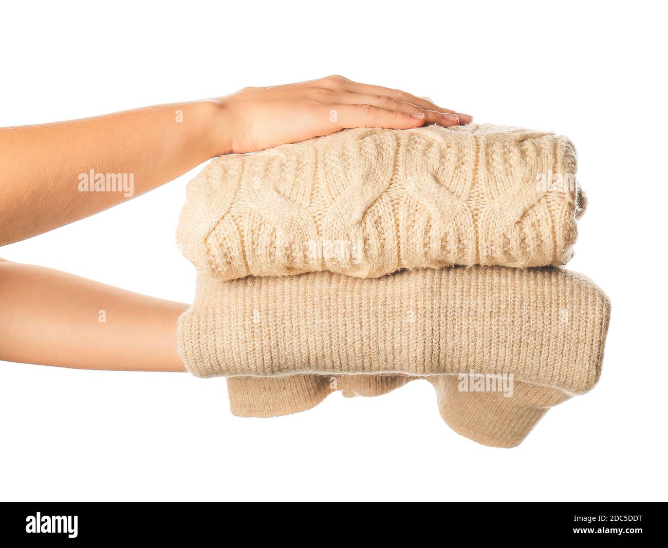 Female hands with warm clothes on white background Stock Photo - Alamy