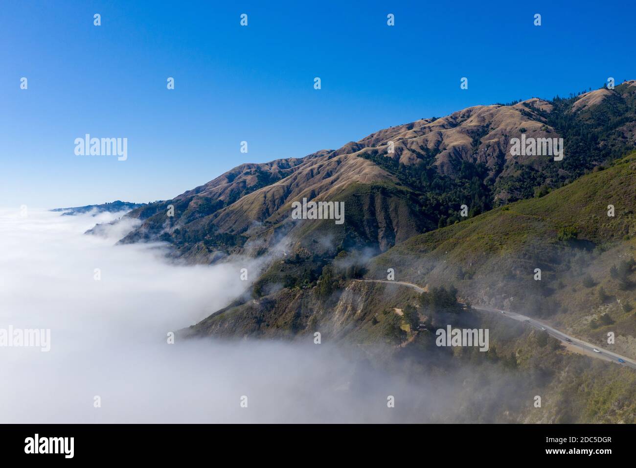 Ocean fog rolling in onto Highway 1 and Big Sur, California, USA Stock ...