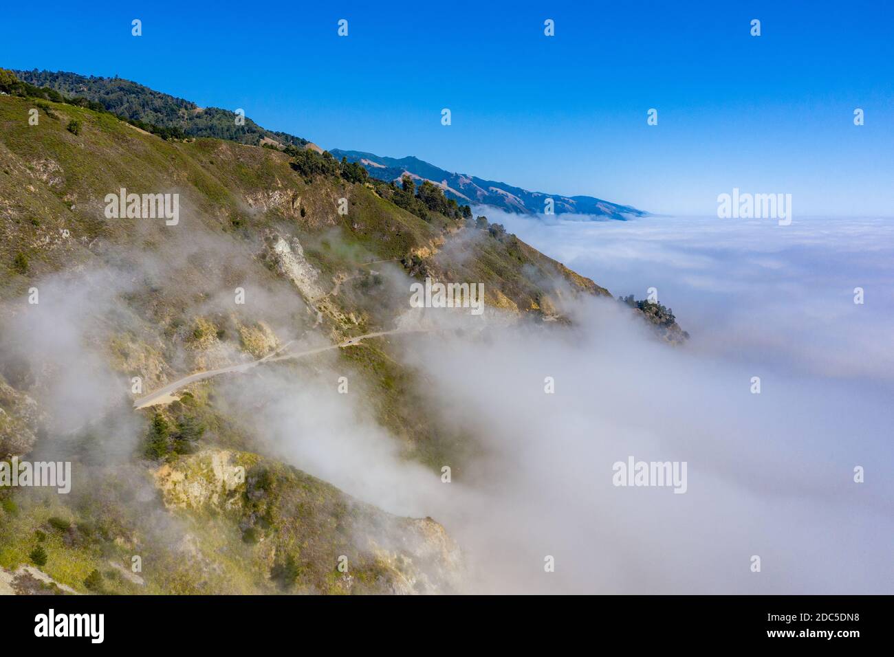 Ocean fog rolling in onto Highway 1 and Big Sur, California, USA Stock ...