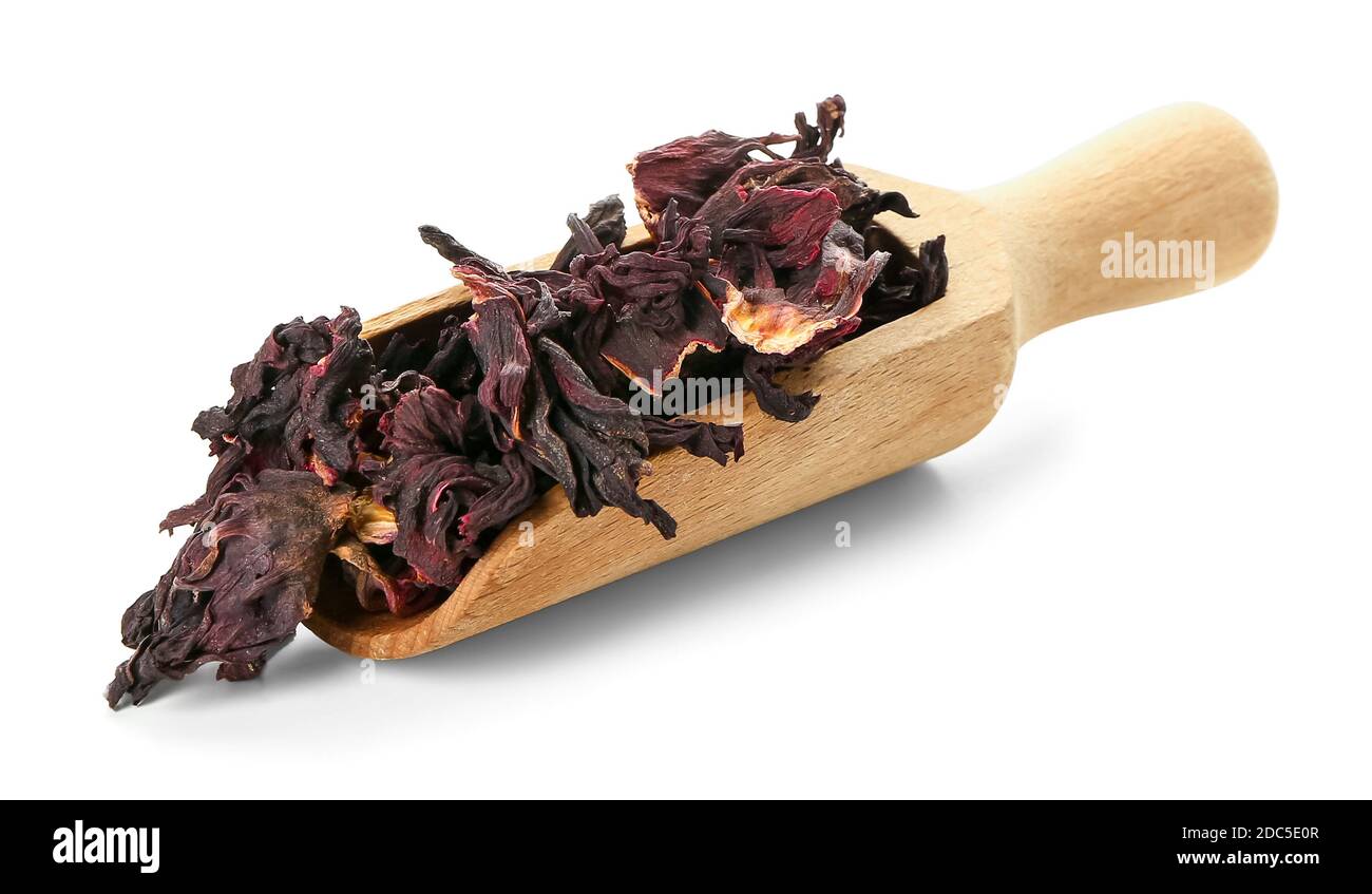 Scoop with dry hibiscus tea on white background Stock Photo - Alamy