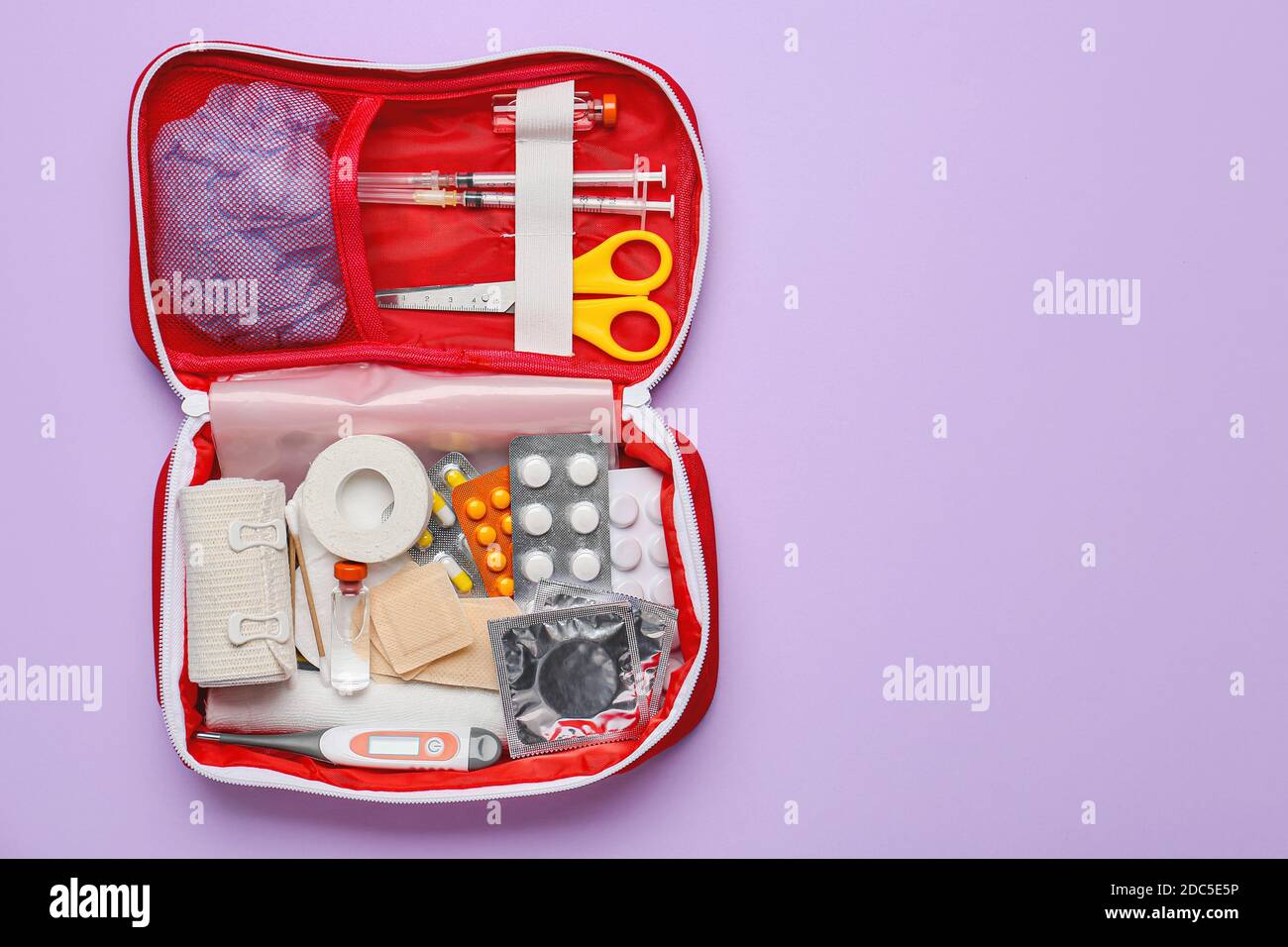 First aid kit on color background Stock Photo - Alamy