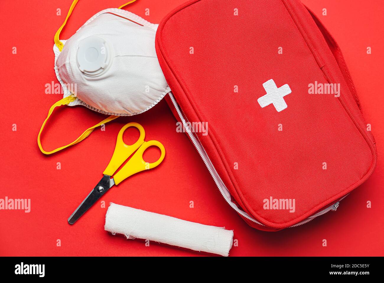 First aid kit on color background Stock Photo - Alamy