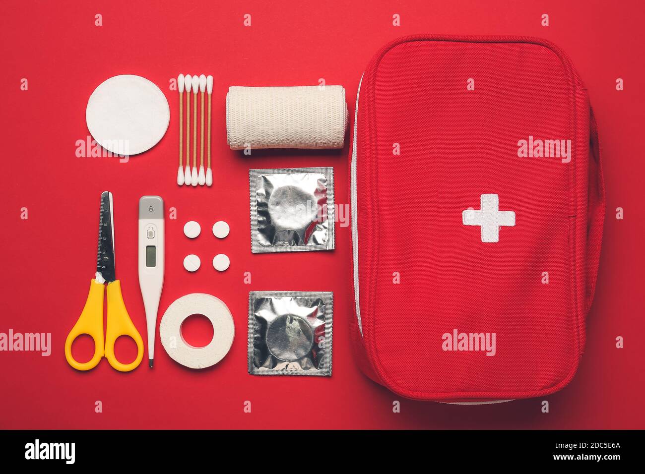First aid kit on color background Stock Photo - Alamy