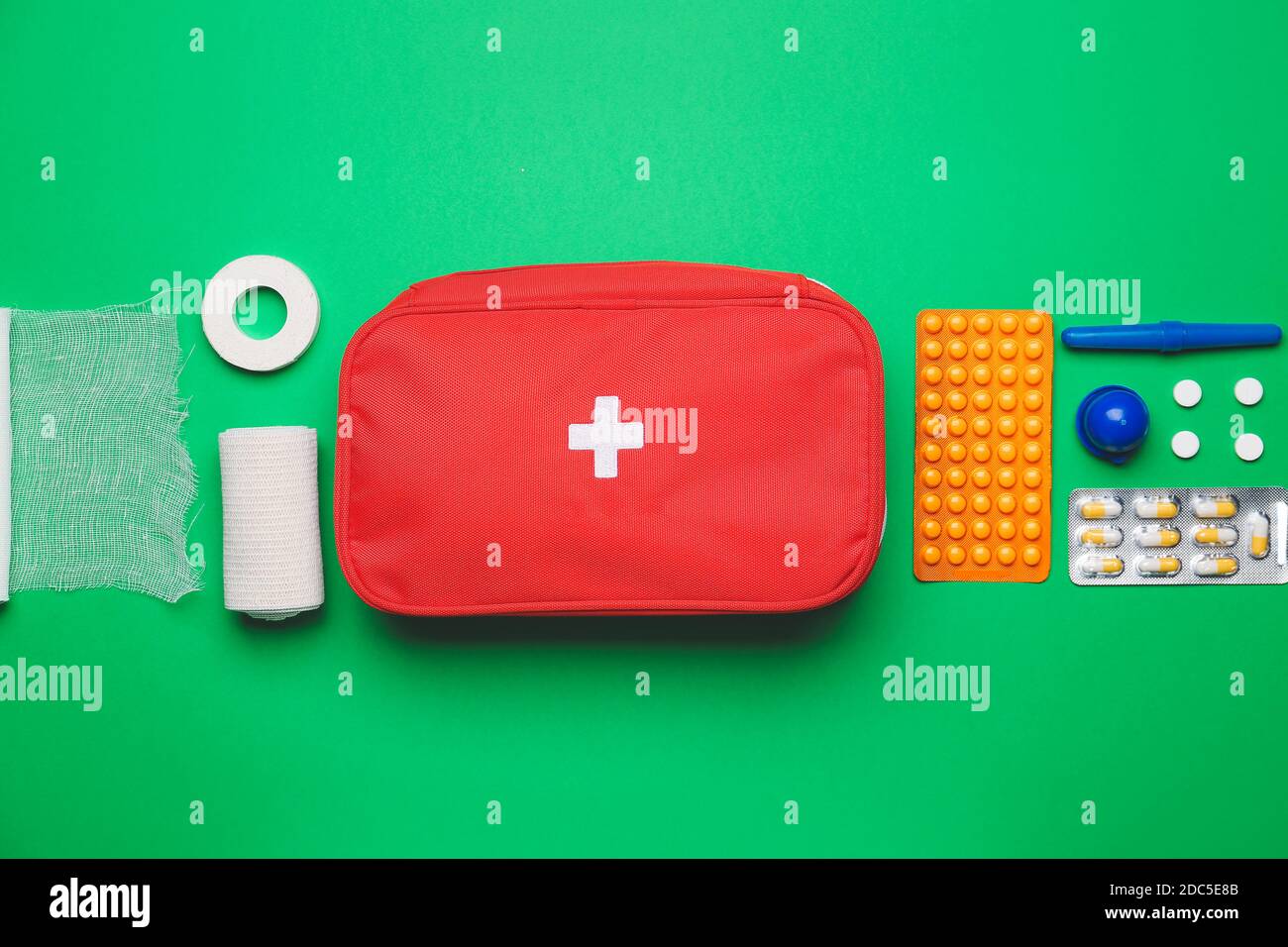 First aid kit on color background Stock Photo - Alamy
