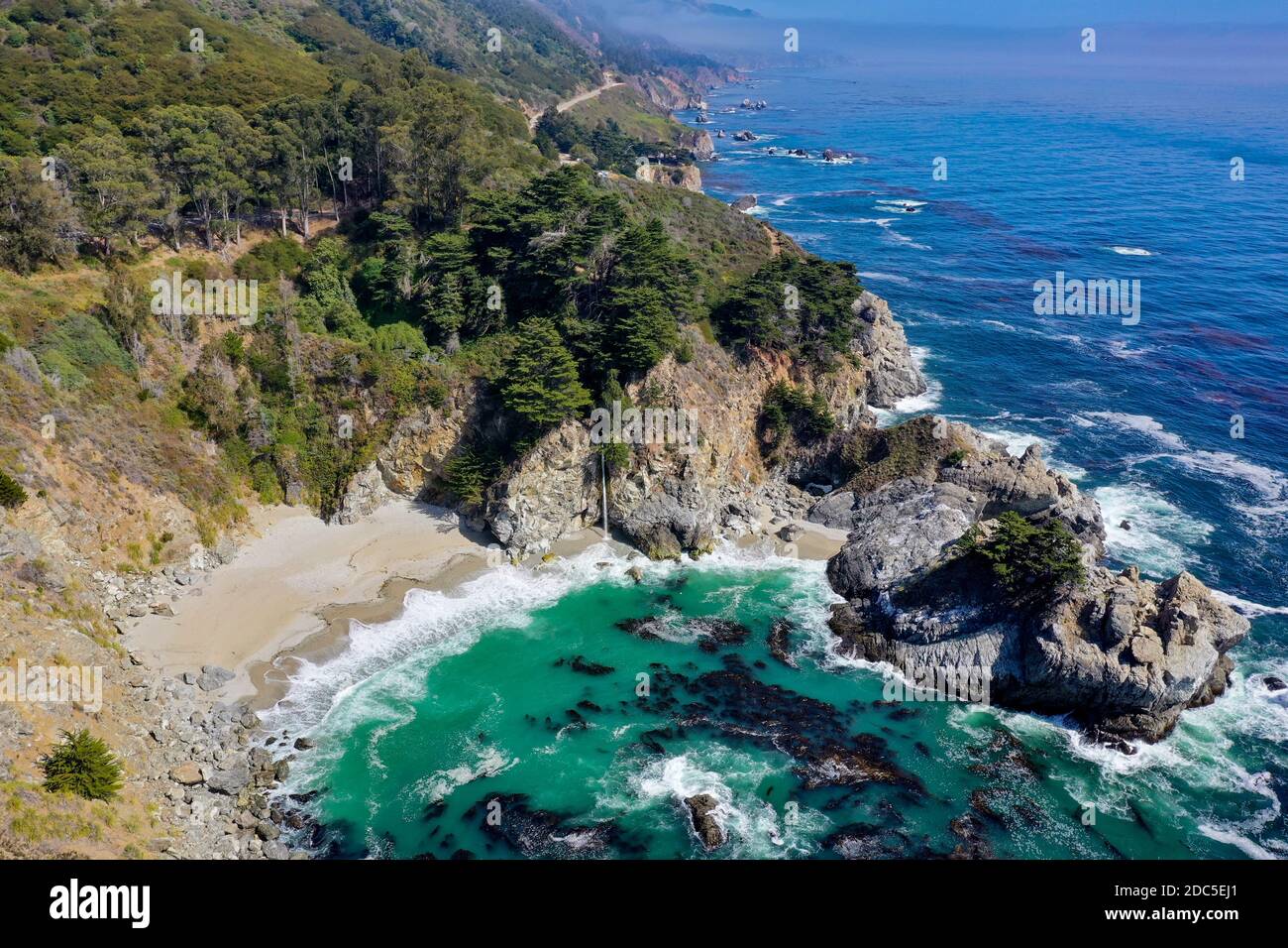 McWay Falls is an 80-foot-tall waterfall on the coast of Big Sur in ...