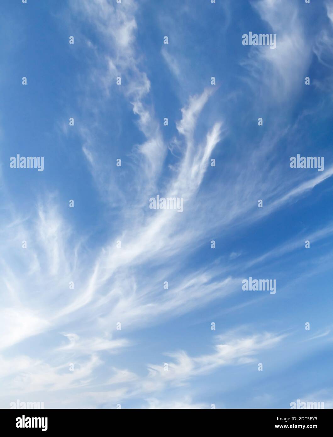 Blue sky with light clouds backdrop texture Stock Photo - Alamy