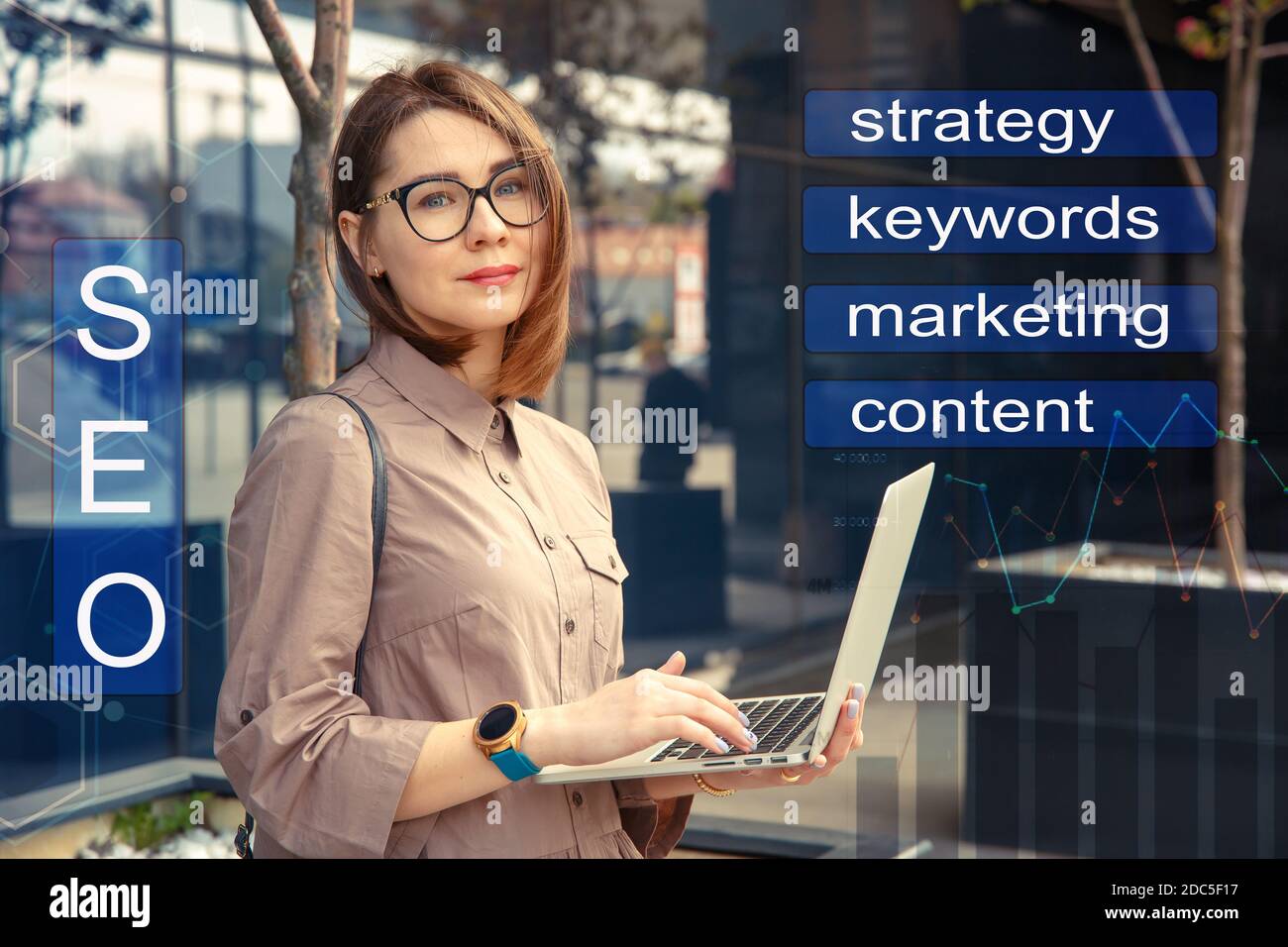 Business woman with computer on the background of a modern corporate ...