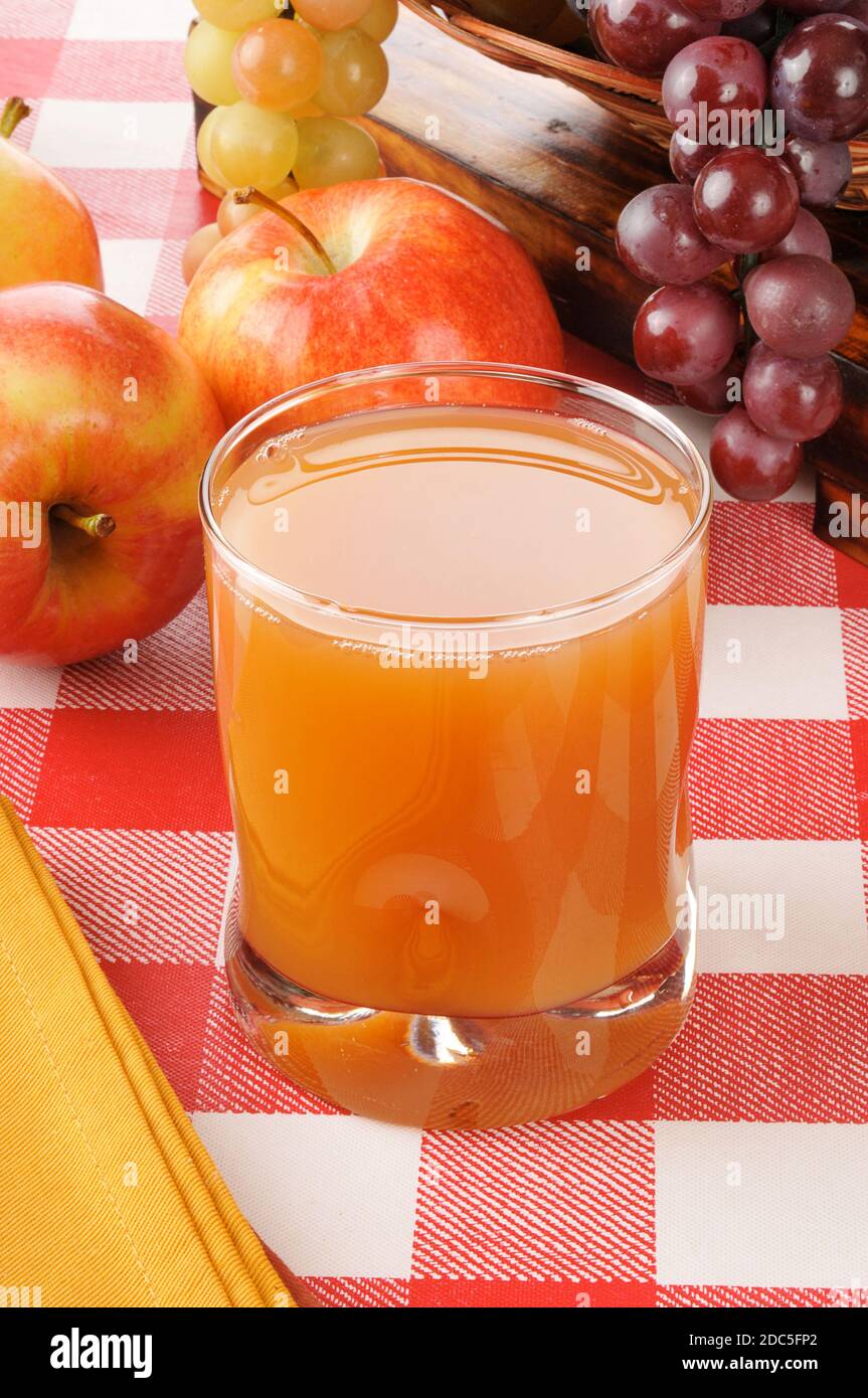 A glass of fresh unfiltered apple juice Stock Photo - Alamy
