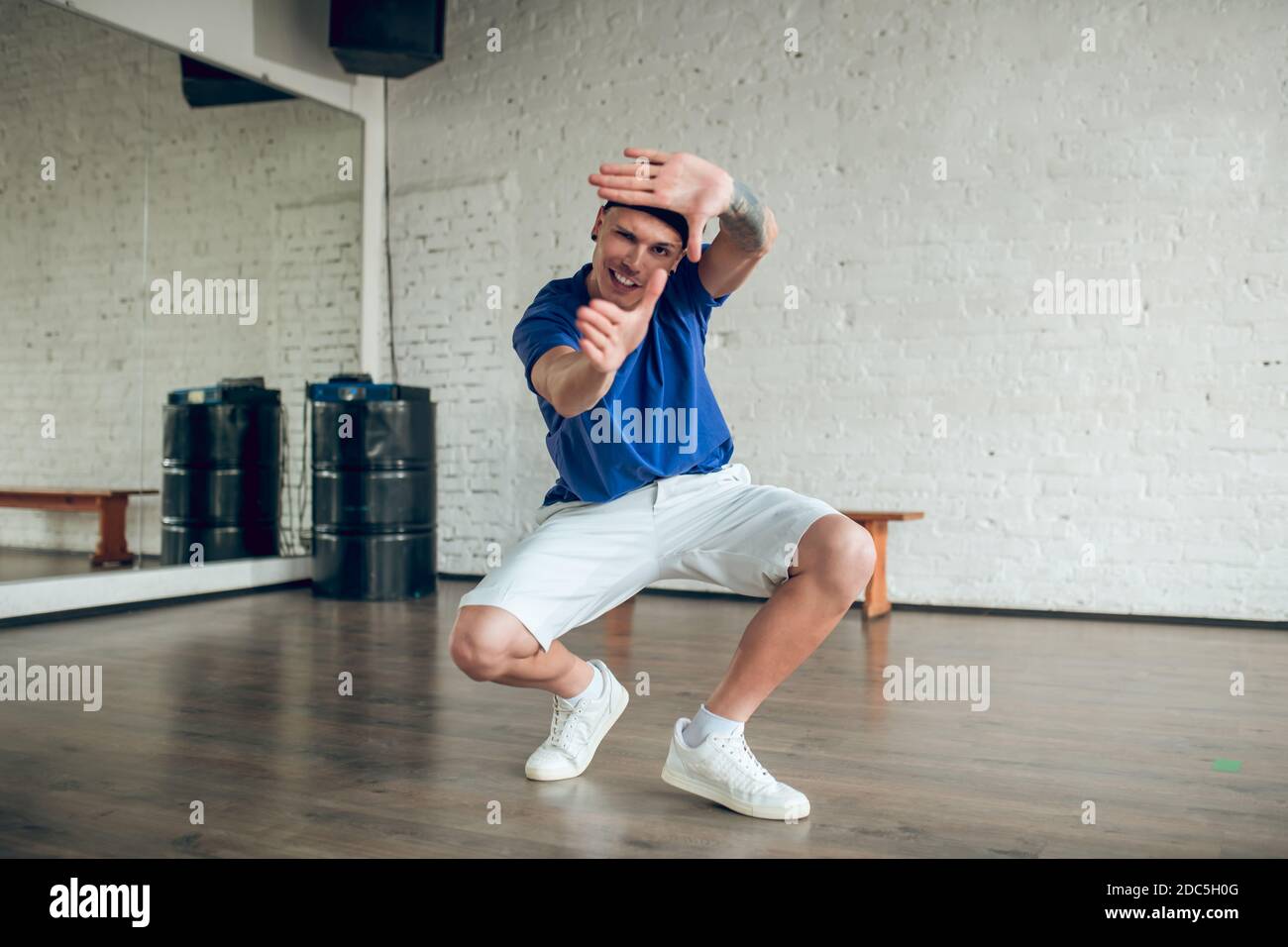 Man making extensive and complicated movements while dancing Stock ...