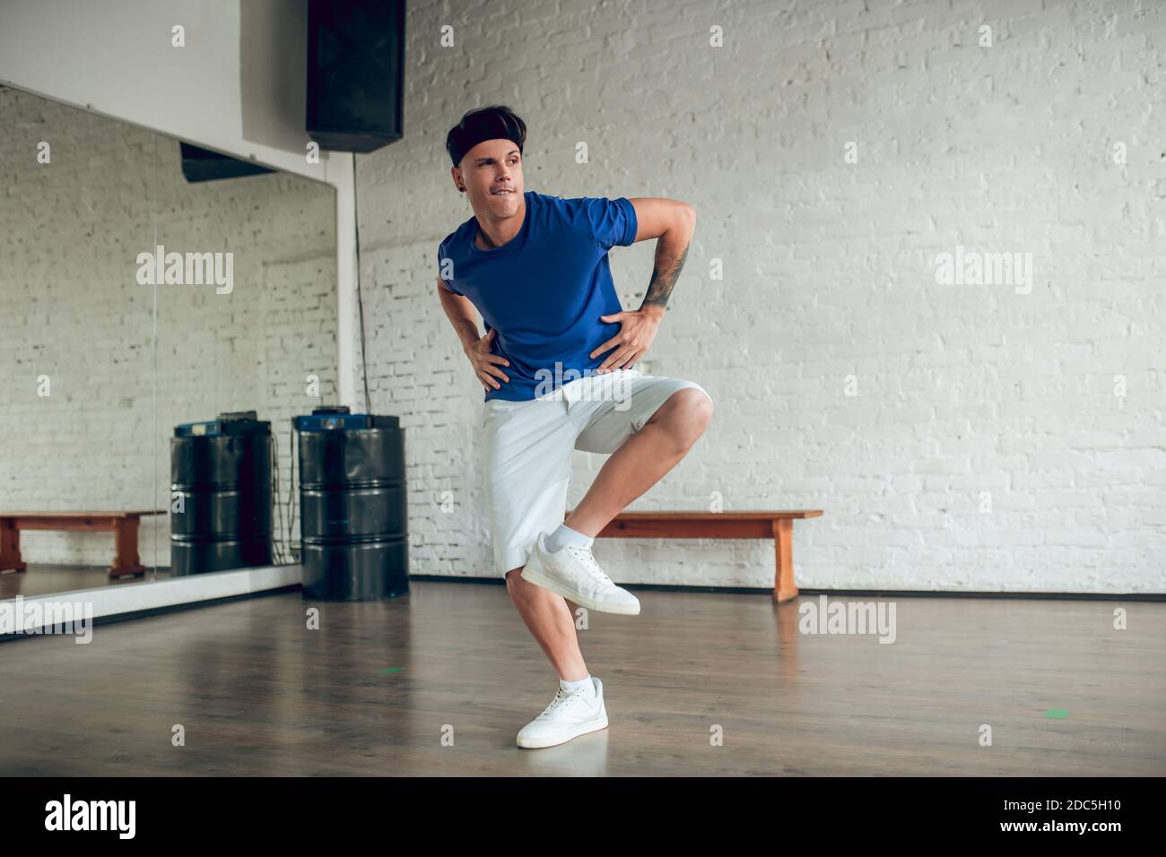 Man making a stomp movement while dancing Kramp Stock Photo - Alamy
