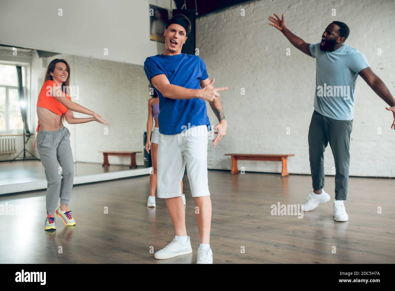 Dancing team having a common rehearsal in a dance school Stock Photo ...
