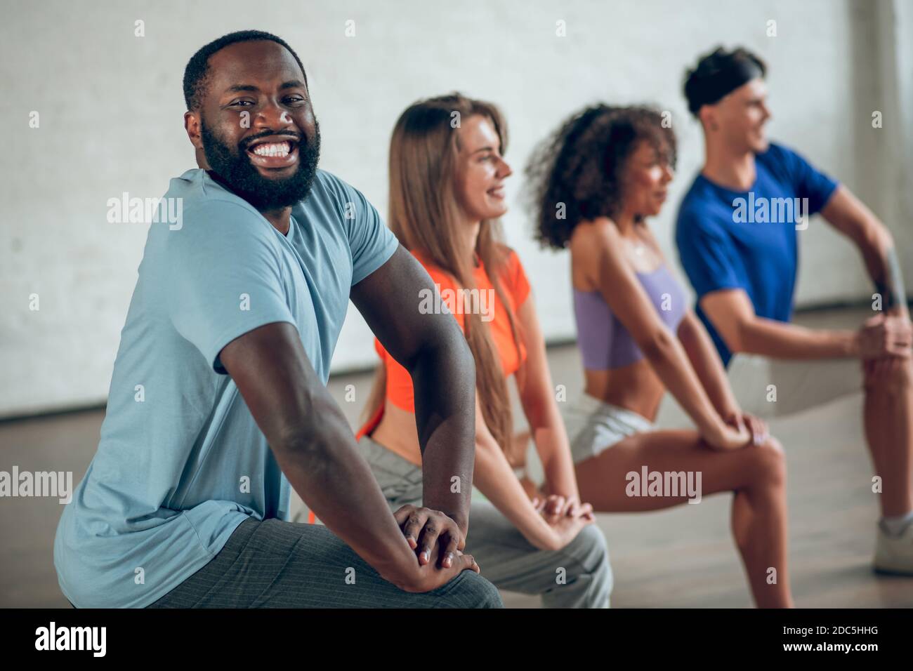 Dancers feeling good while doing stretching exercises Stock Photo - Alamy