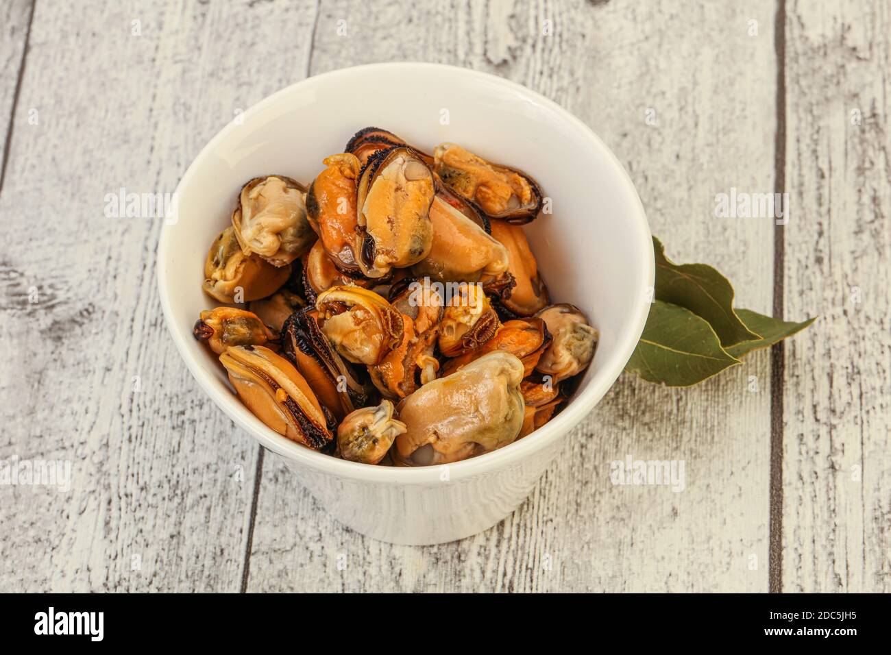 Pickled mussels with spices in the bowl Stock Photo - Alamy