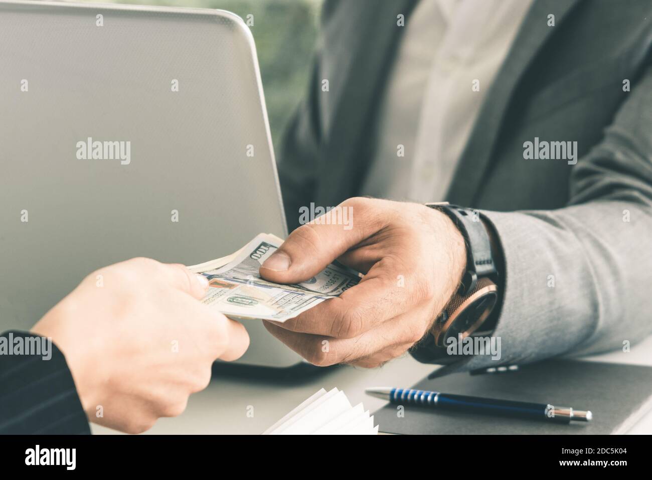 Hand giving paper another hand hi-res stock photography and images - Alamy