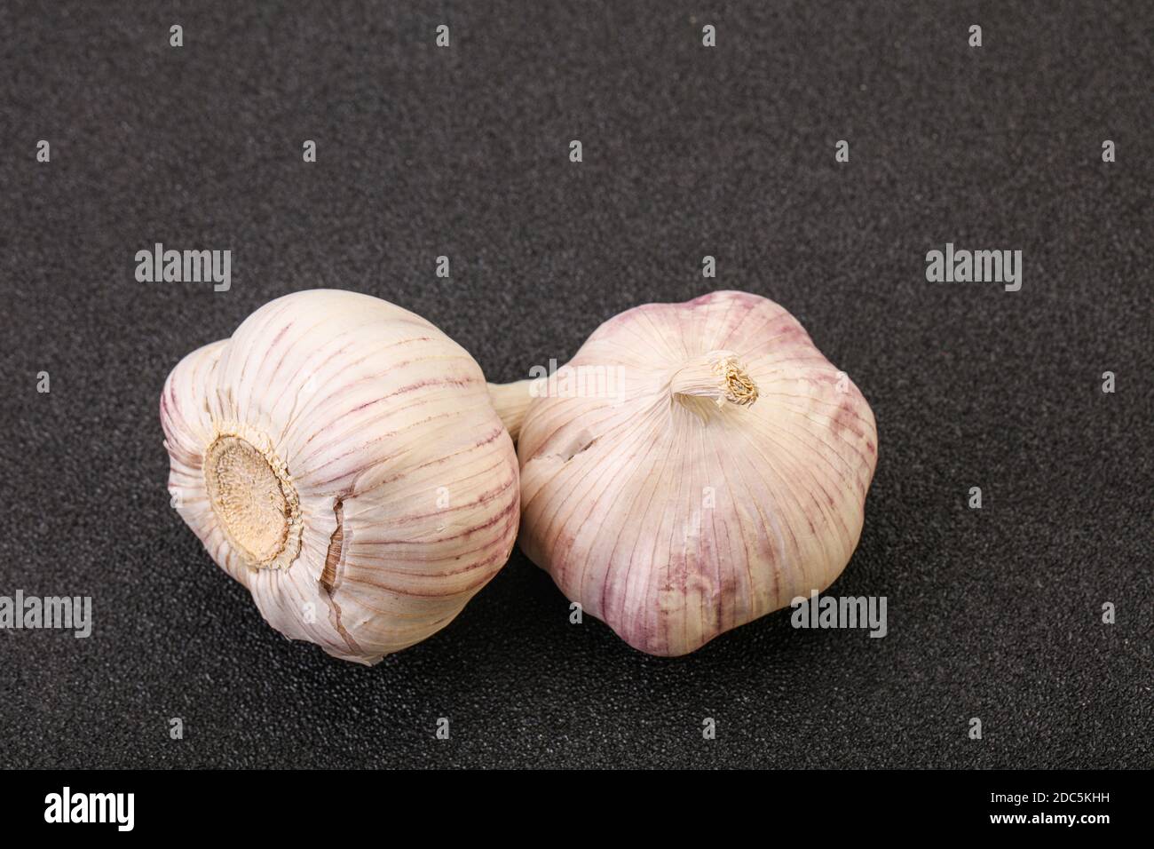 Fresh ripe and tasty garlic isolated Stock Photo - Alamy