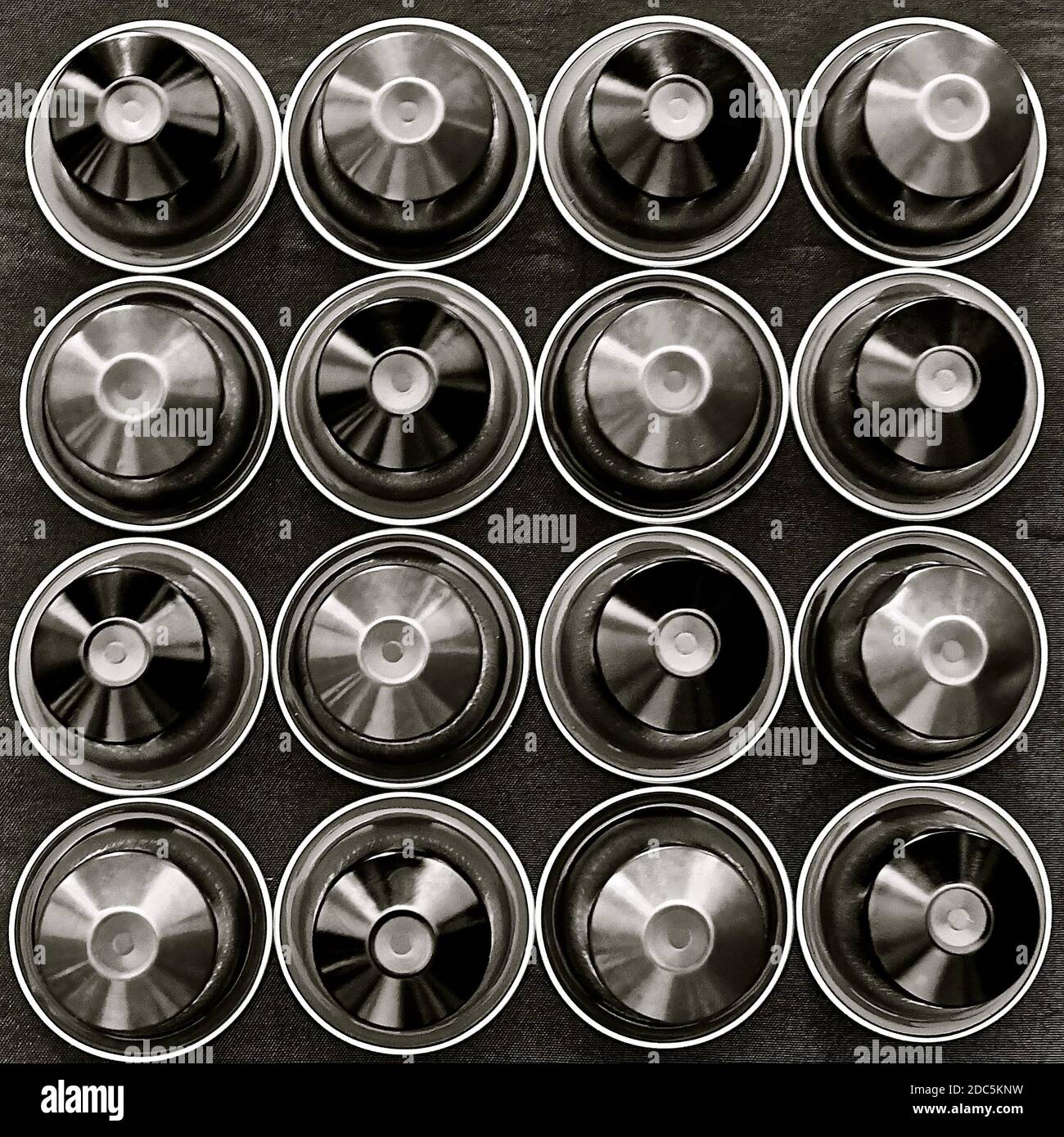 Black and white aerial view of a square grid pattern of silver and ...