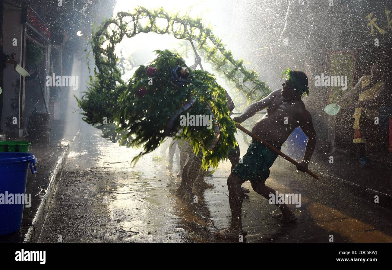 Pengan, China. 18th Nov, 2020. The traditional water dragon dance is ...