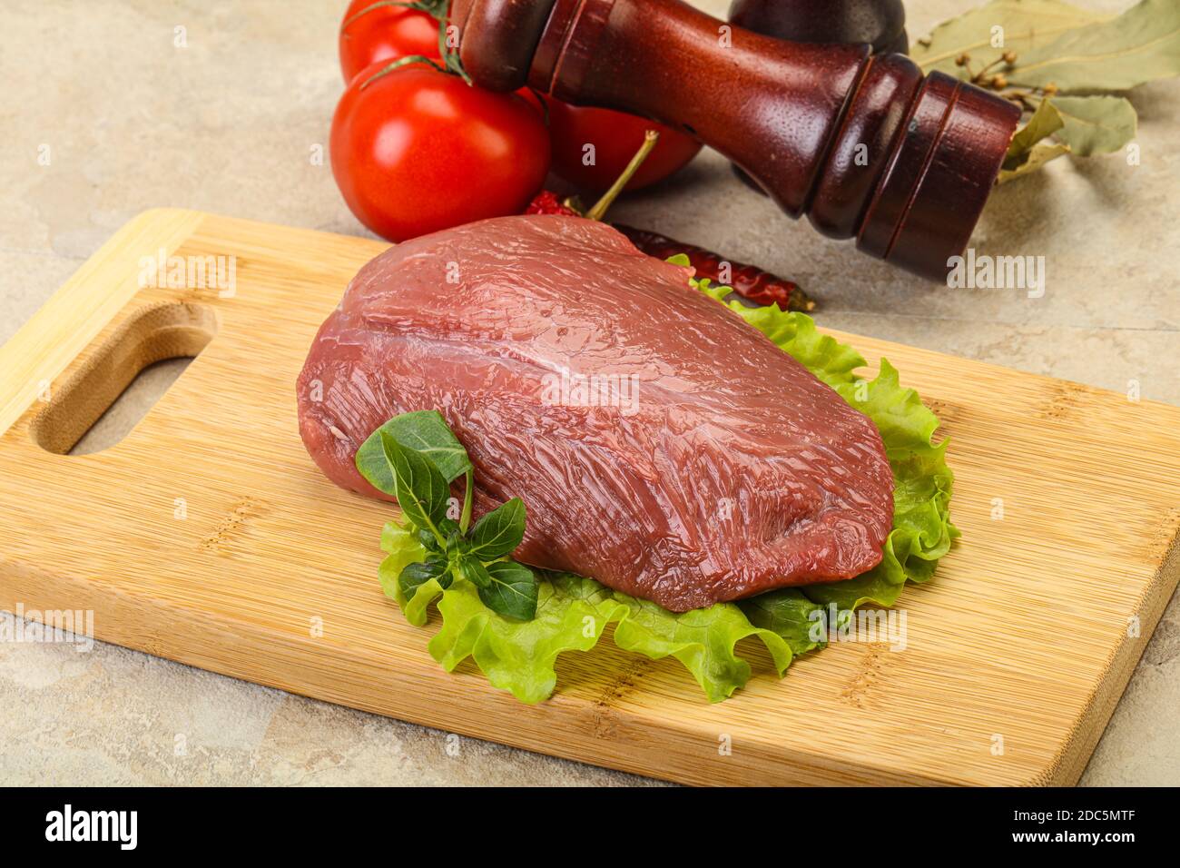 Raw beef meat piece for cooking Stock Photo - Alamy