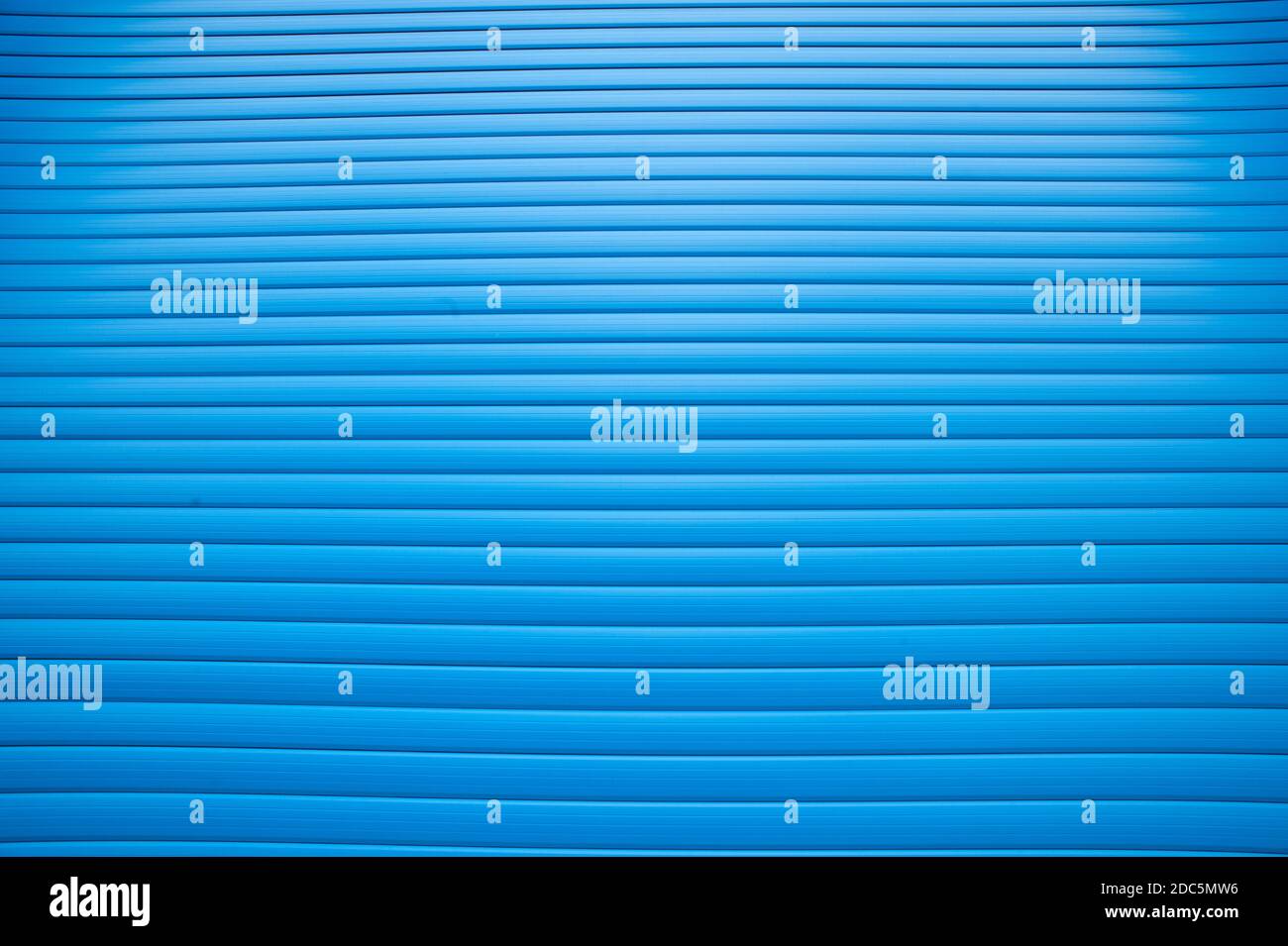 Blue industrial shutter doors Stock Photo - Alamy