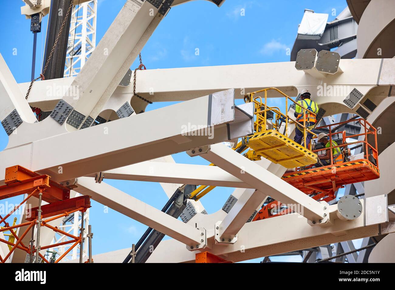 Workers on a construction site. Engineering and architectural ...