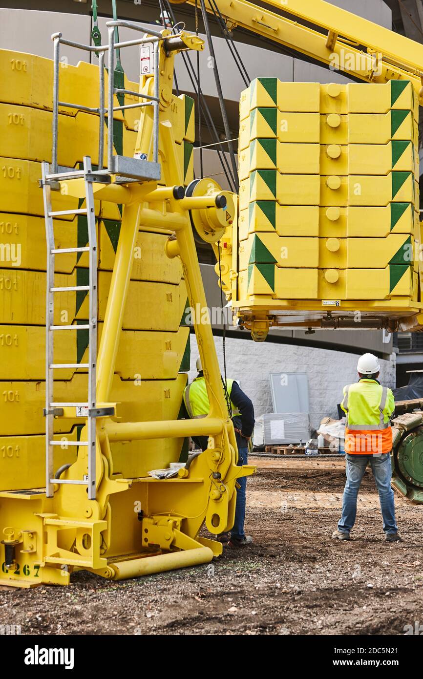 Workers on a construction site. Engineering and architectural ...