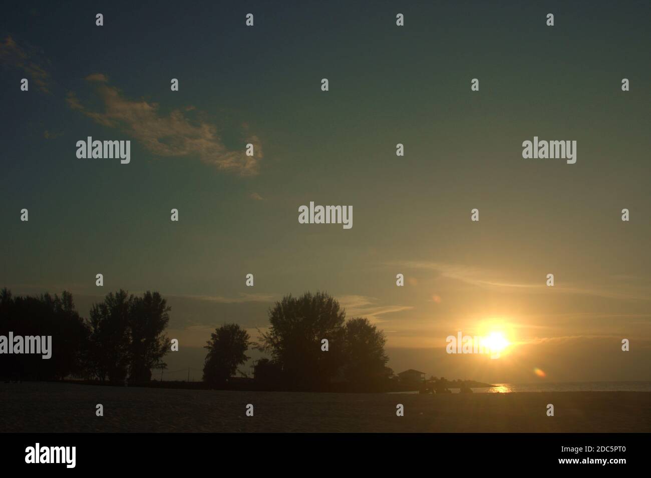 beautiful glory golden sunset in Port Dickson beach in Malaysia Stock ...