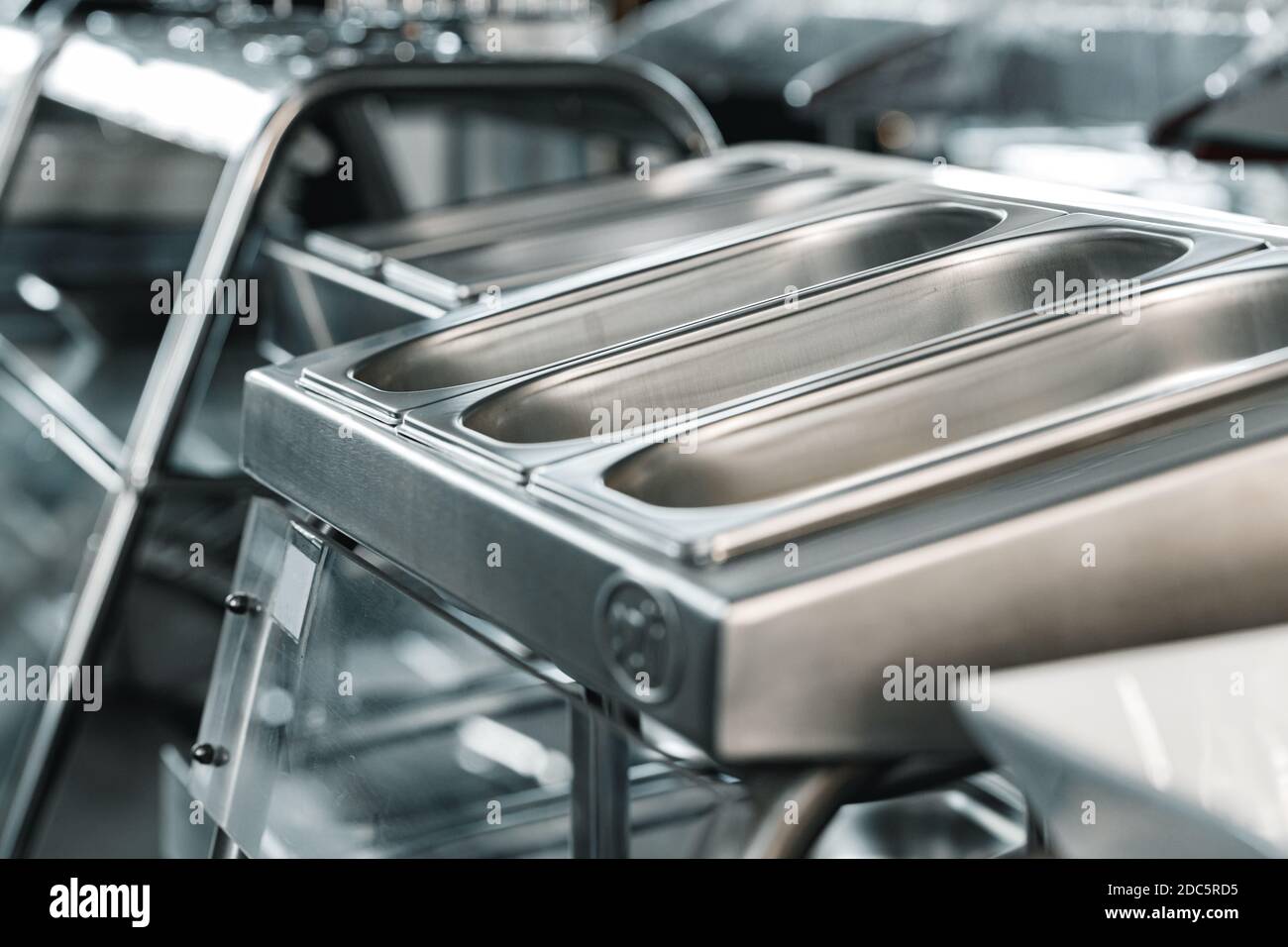 Industrial kitchen metal trays for buffet catering Stock Photo - Alamy