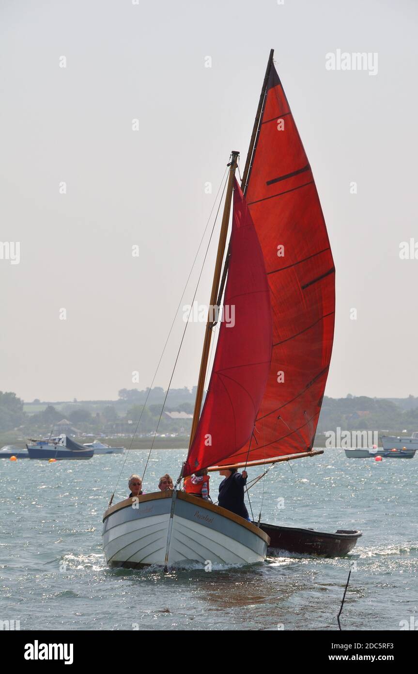 Dinghy With Red Sails High Resolution Stock Photography and Images - Alamy