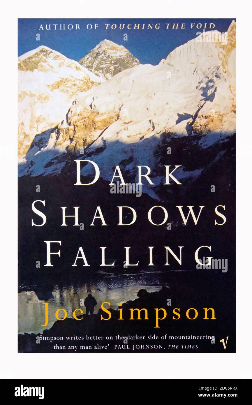 Book cover "Dark Shadows Falling" by Joe Simpson Stock Photo - Alamy